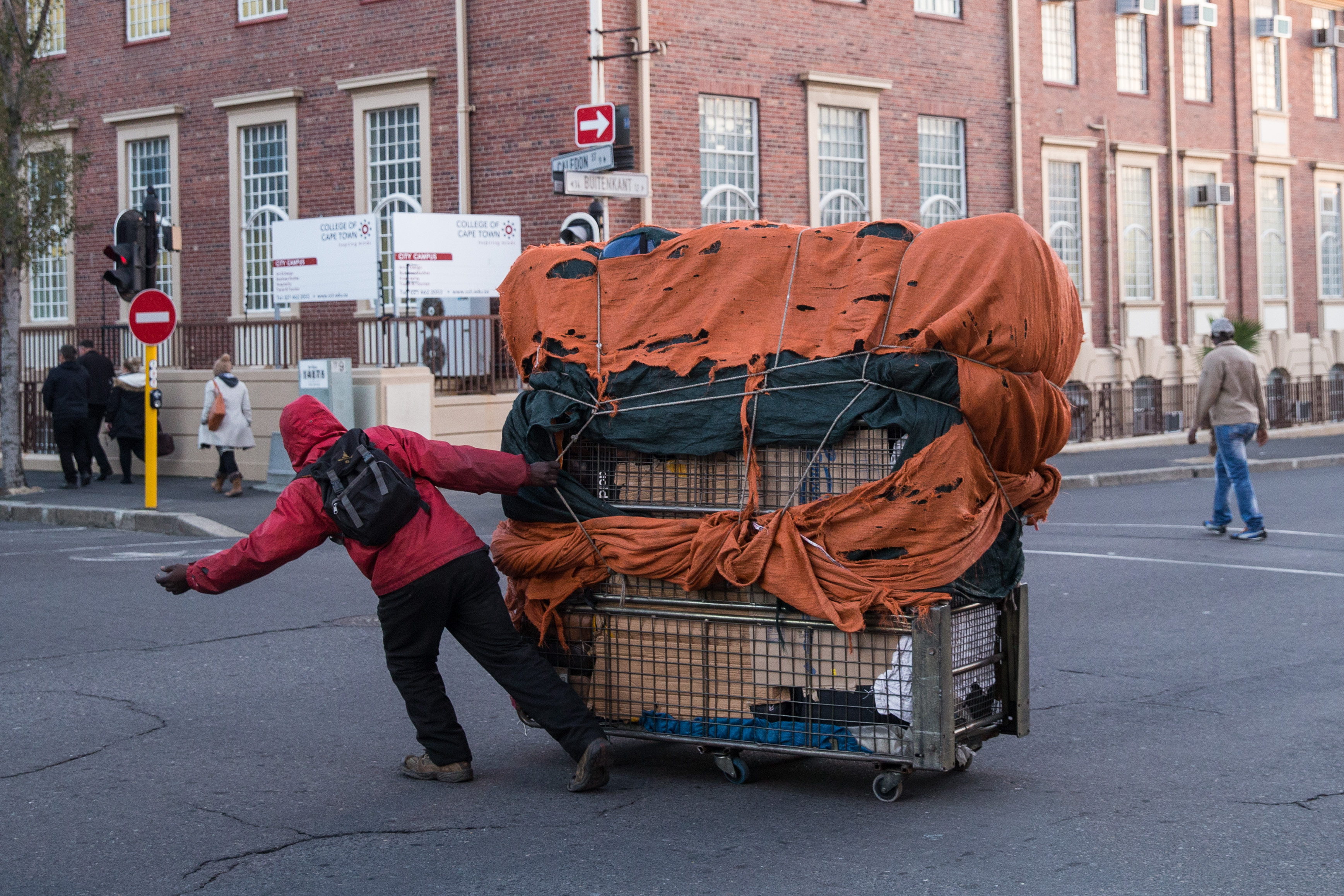 Hard work and little pay: pushing heavily-laden trolleys while dodging ...