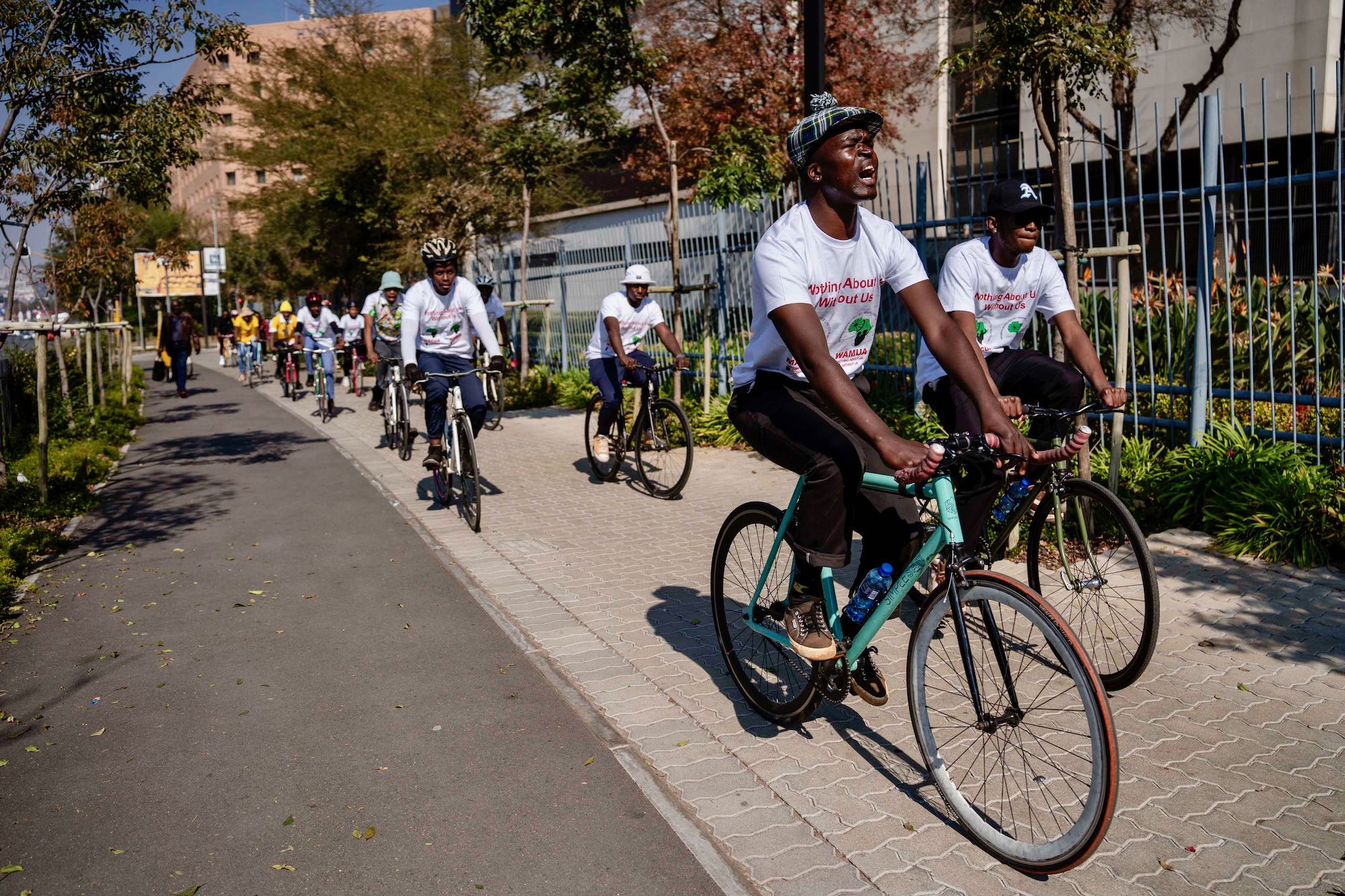 Youth take to their bikes to protest against mining companies | GroundUp