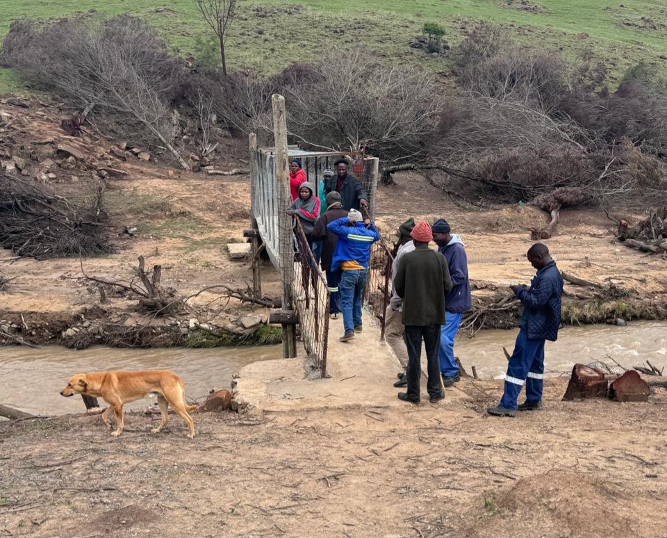 Villagers build bridge over dangerous river after waiting 13 years for ...
