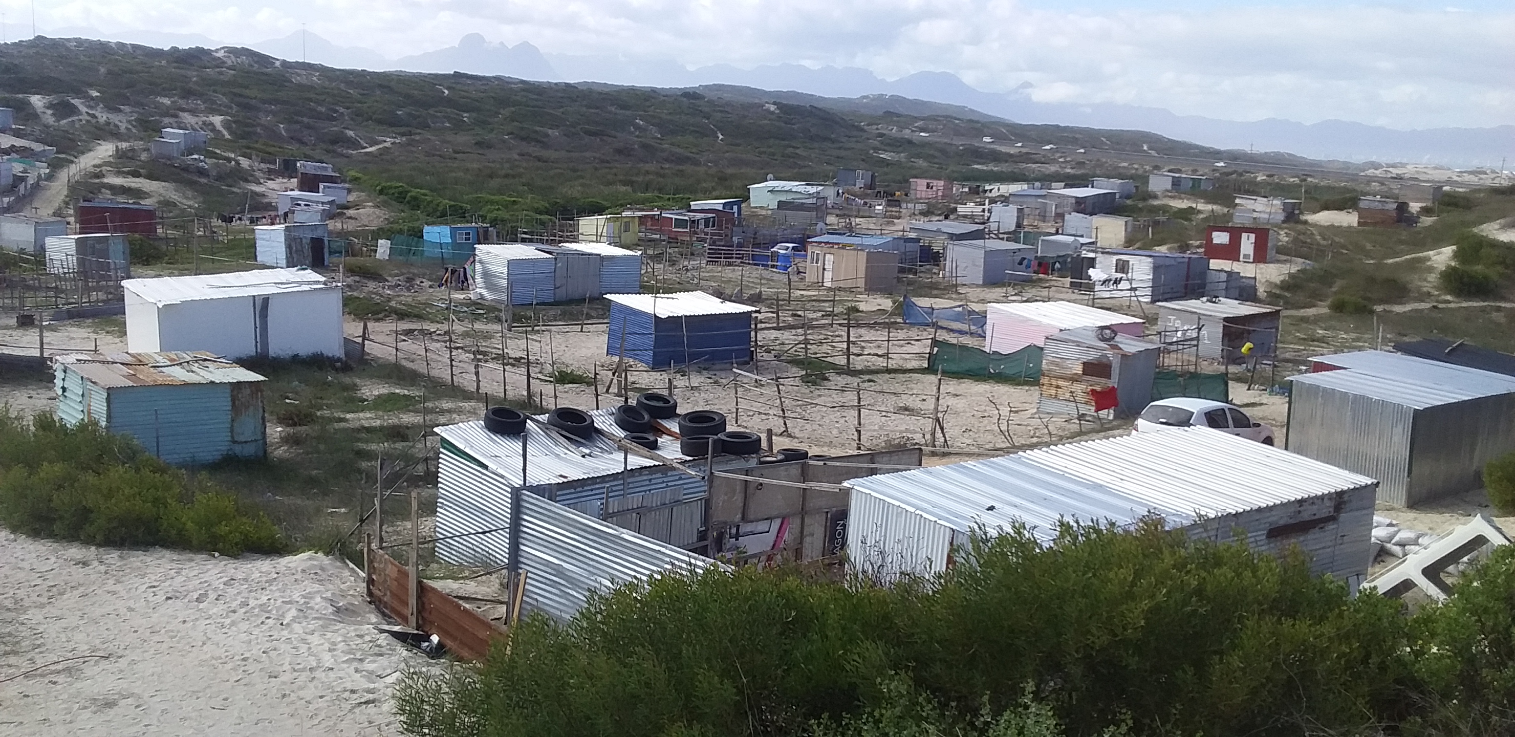 Protesters blocking major Cape Town road want to extend their shacks ...