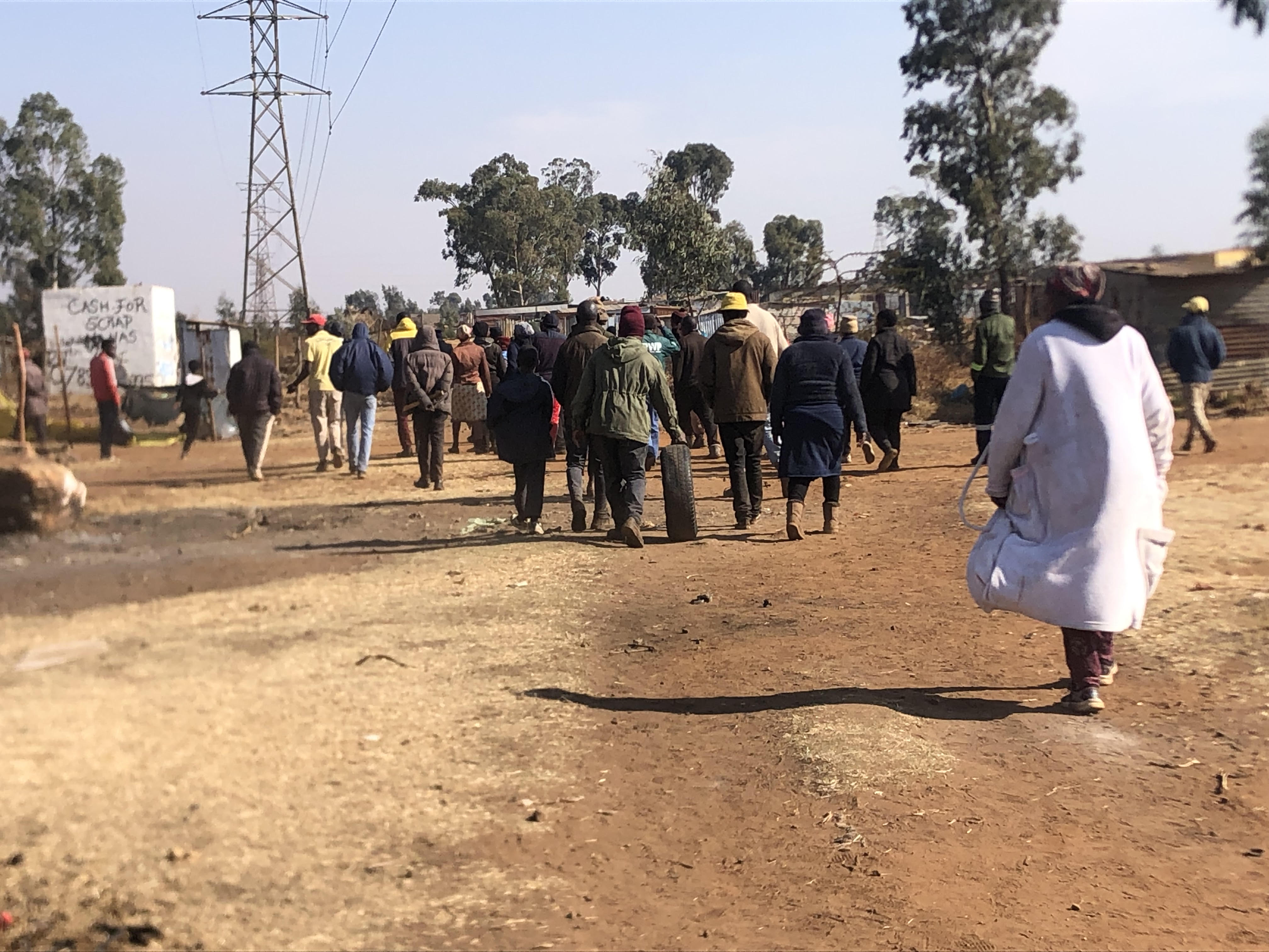 Protesters block N12, demand toilets, water | GroundUp