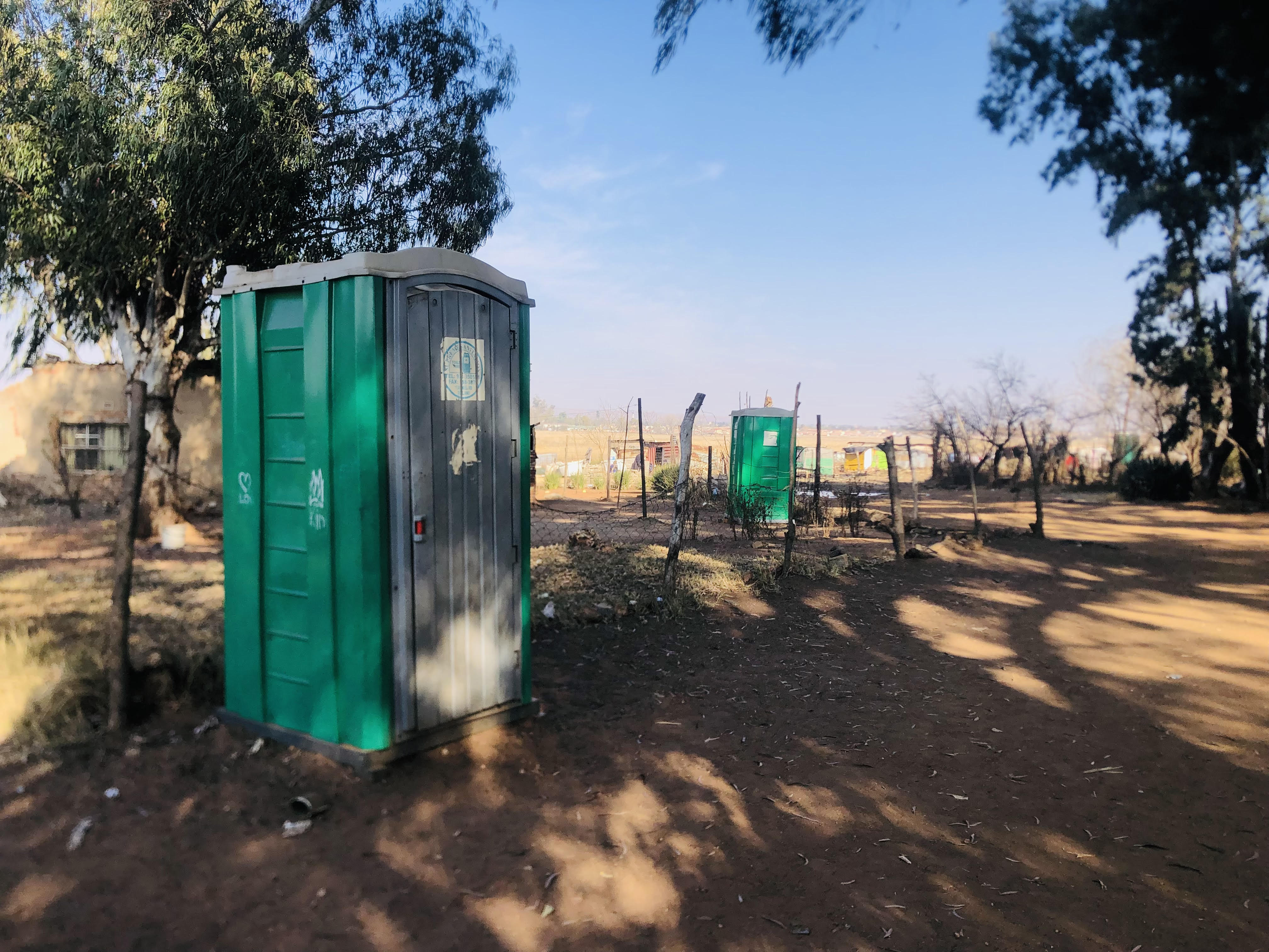 Protesters block N12, demand toilets, water | GroundUp