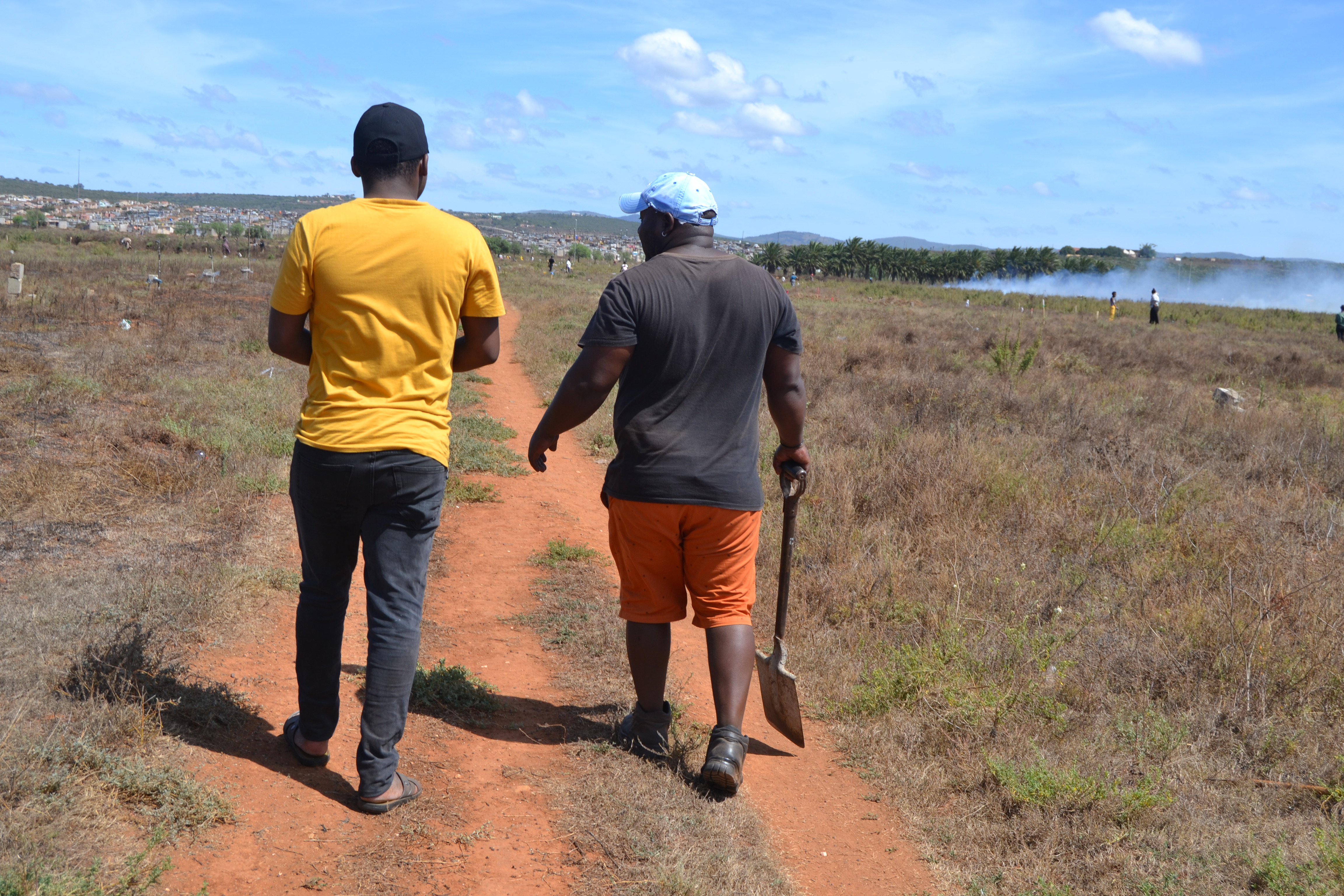 Hundreds of people stake out plots for houses on empty land in Nelson ...