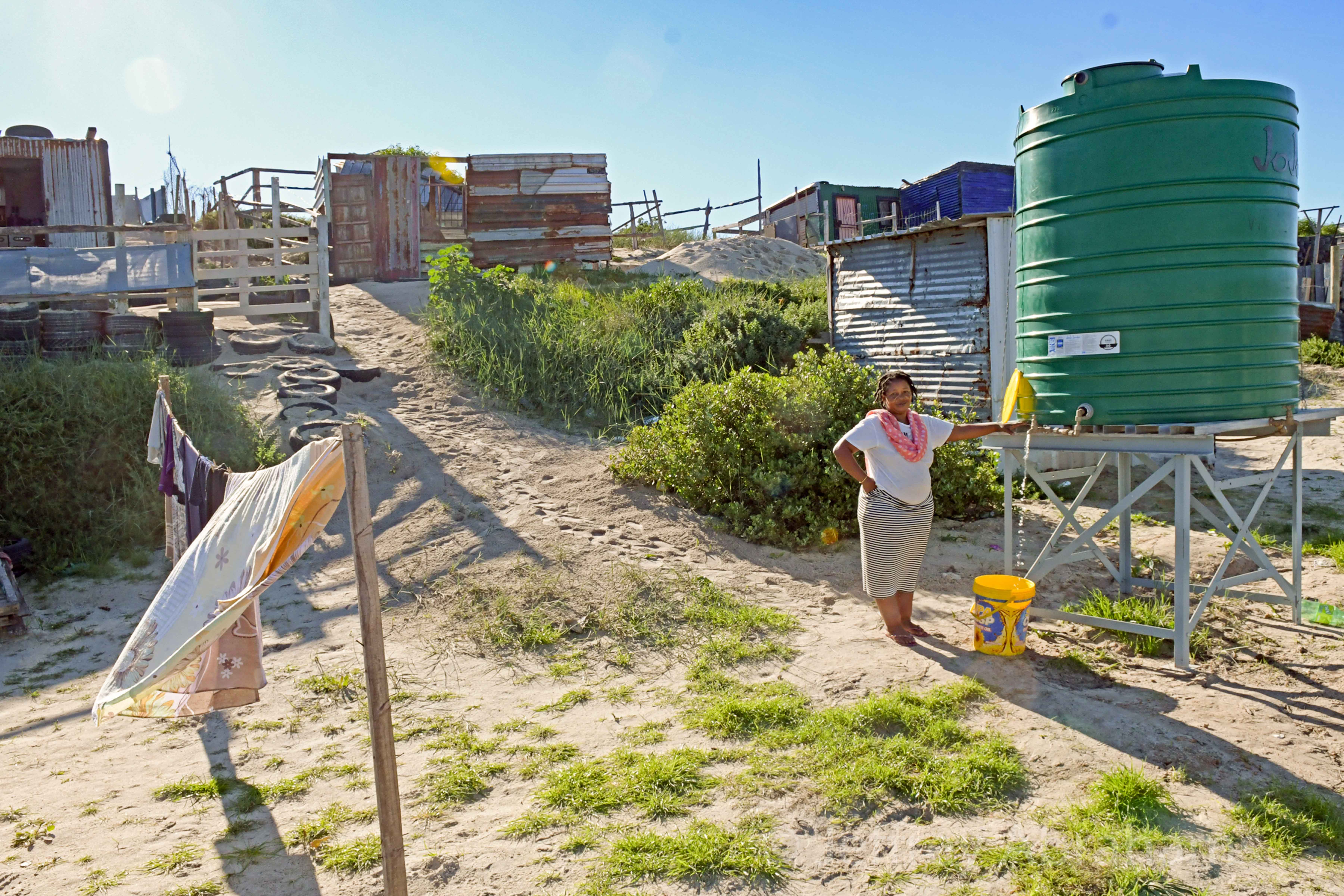 Lockdown in pictures - Day 108: Fetching water | GroundUp