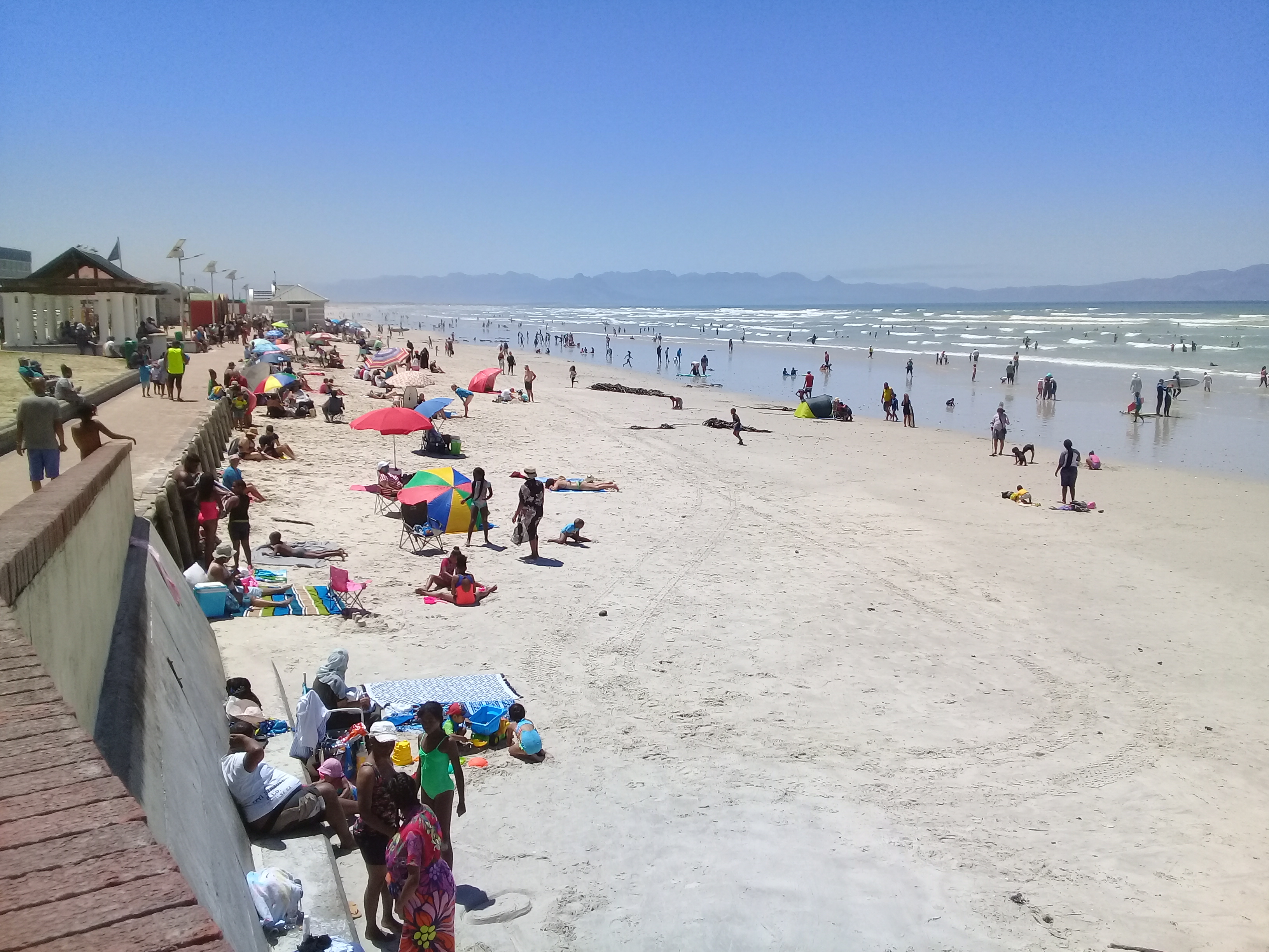 Muizenberg buzzing after Covid-19 beach ban lifted | GroundUp