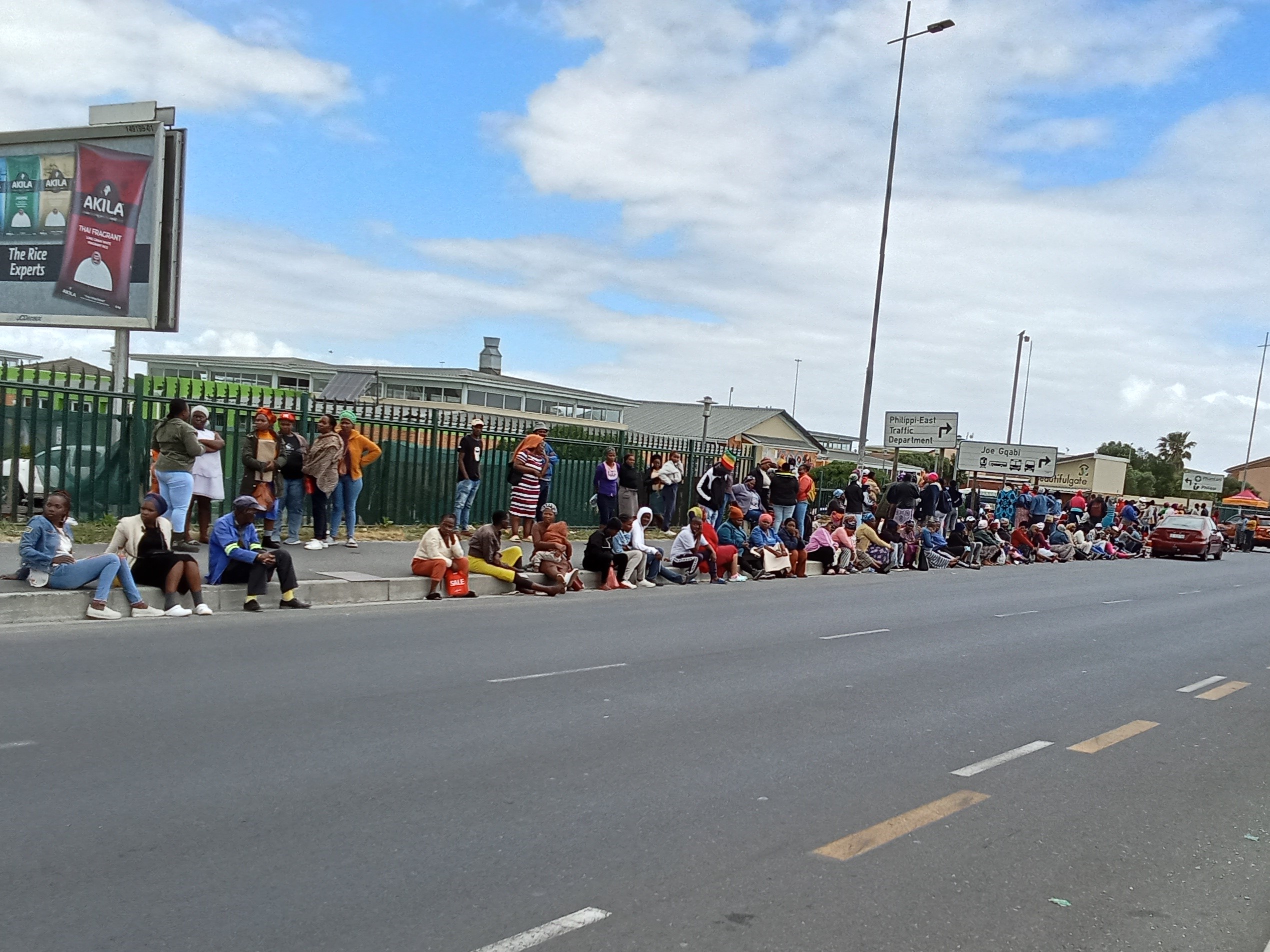 Disability grant applicants sleep outside this SASSA office | GroundUp