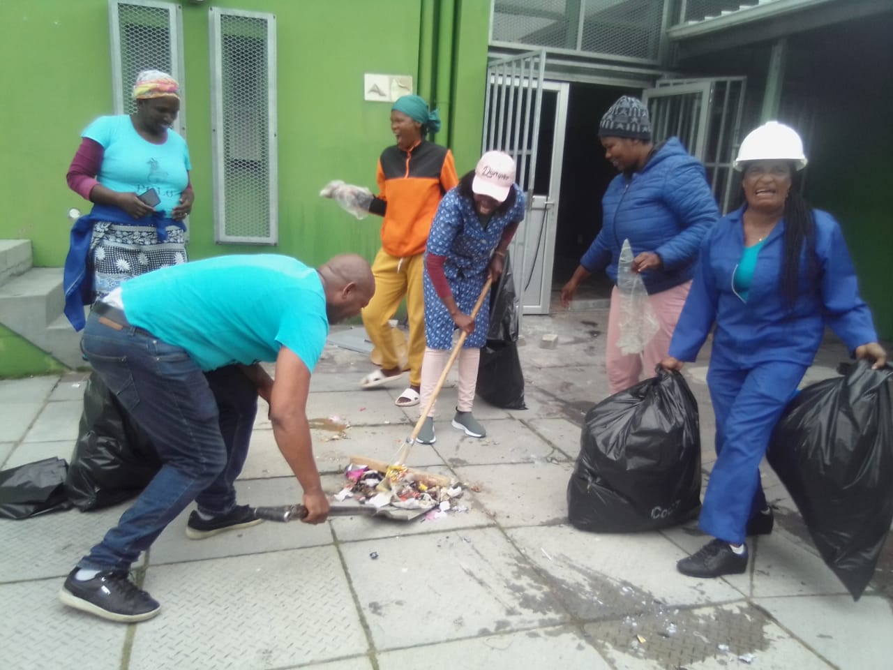 Philippi residents roll up sleeves to clean looted library and ...